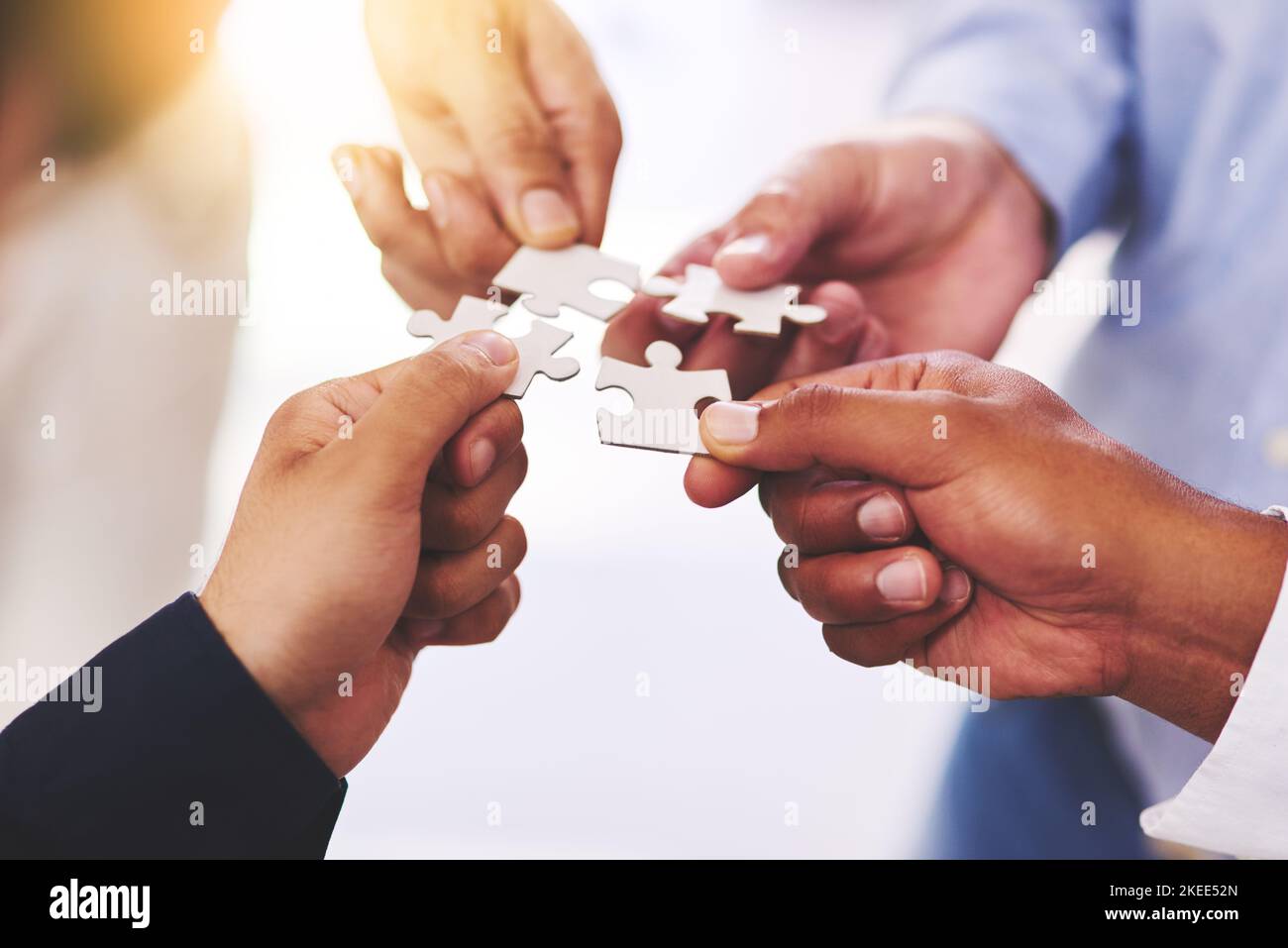 Getting together to see the bigger picture. Closeup shot of a group of ...