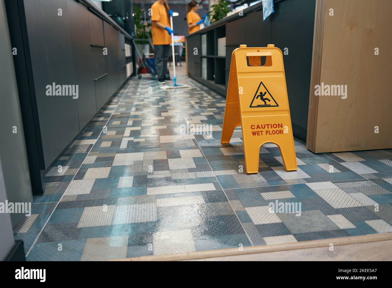 Warning sign Attention wet floor stands indoors on floor Stock Photo ...