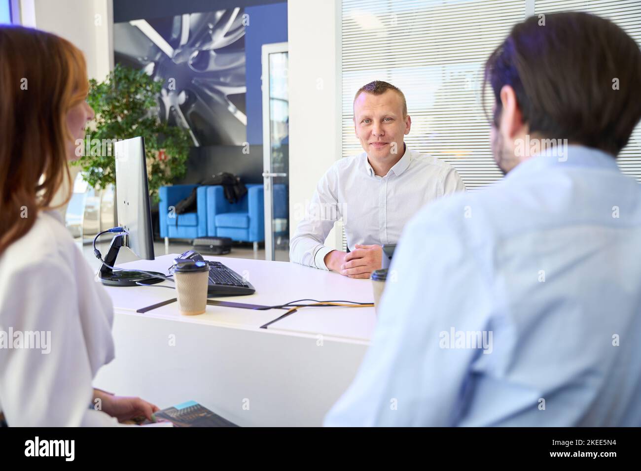 Worker employee customer customers people hi-res stock photography and ...