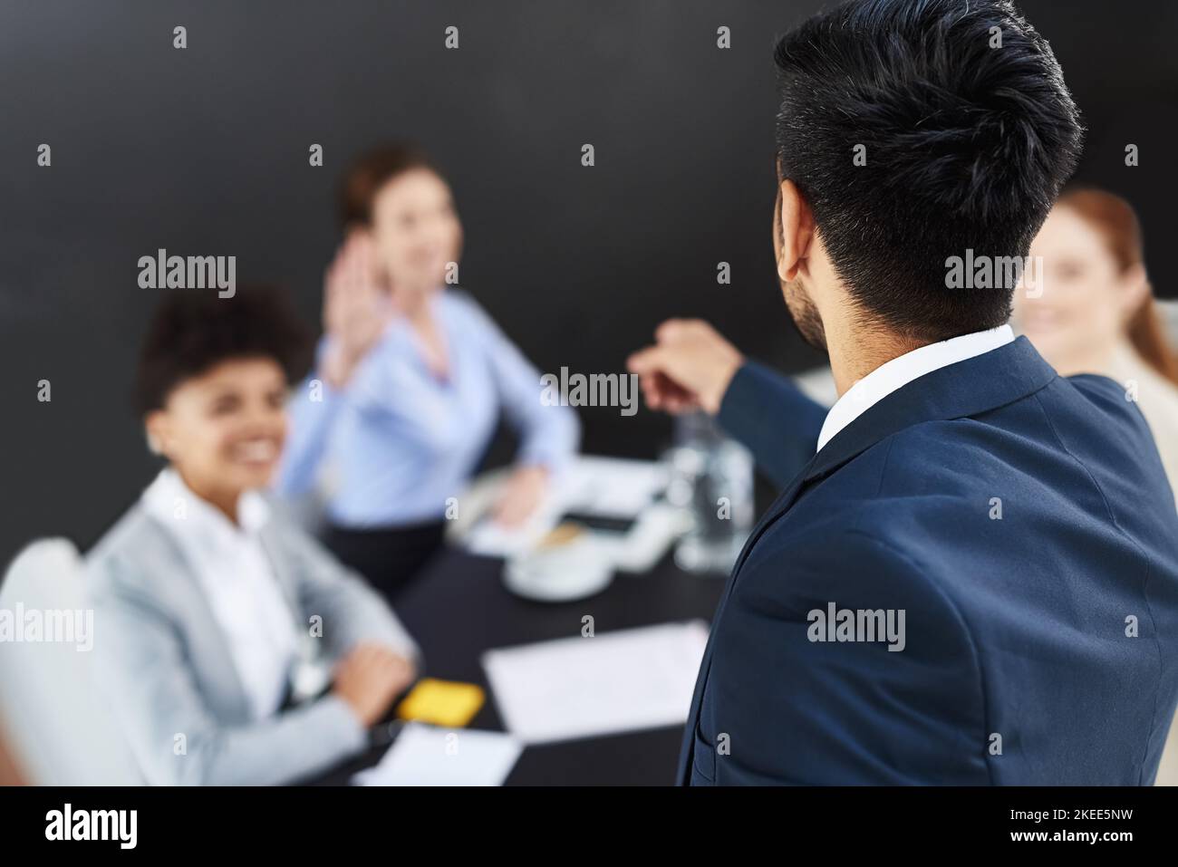 Questions are always welcome. a businessman acknowledging his ...