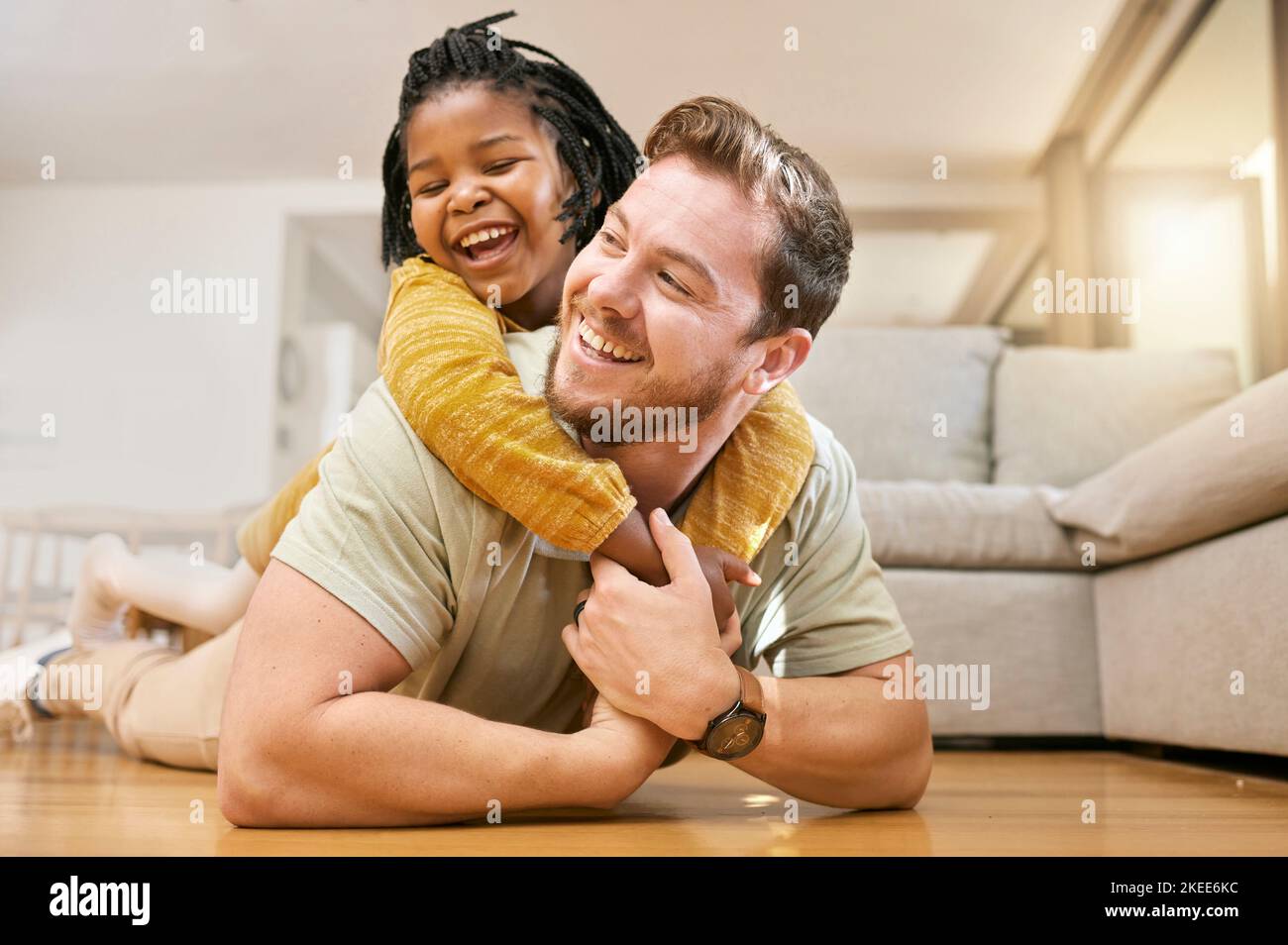 Family, children and fun with a foster father and girl having fun ...