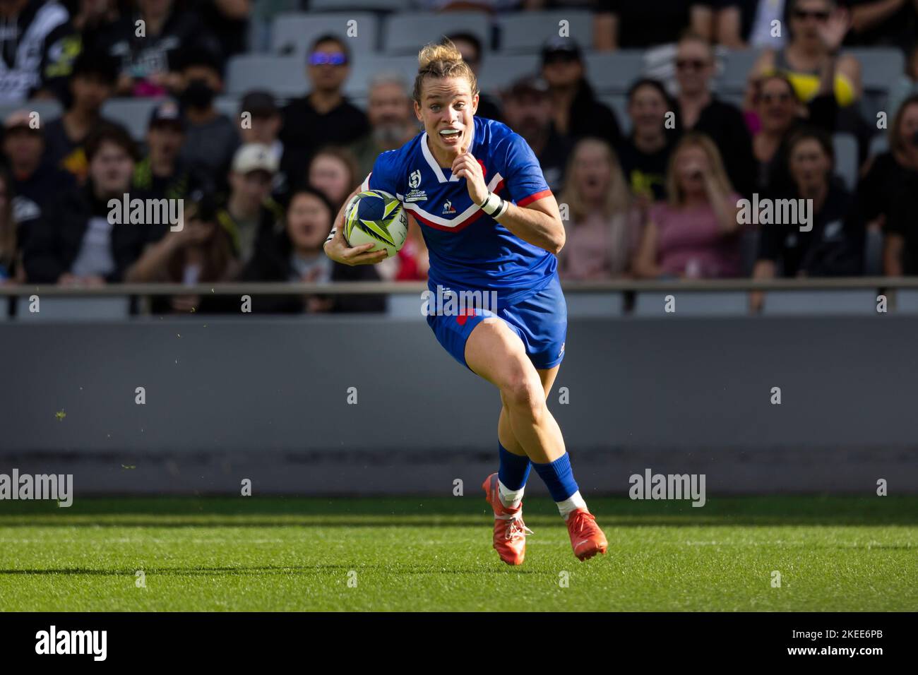France's Marine Menager scores a try during the Women's Rugby World Cup ...