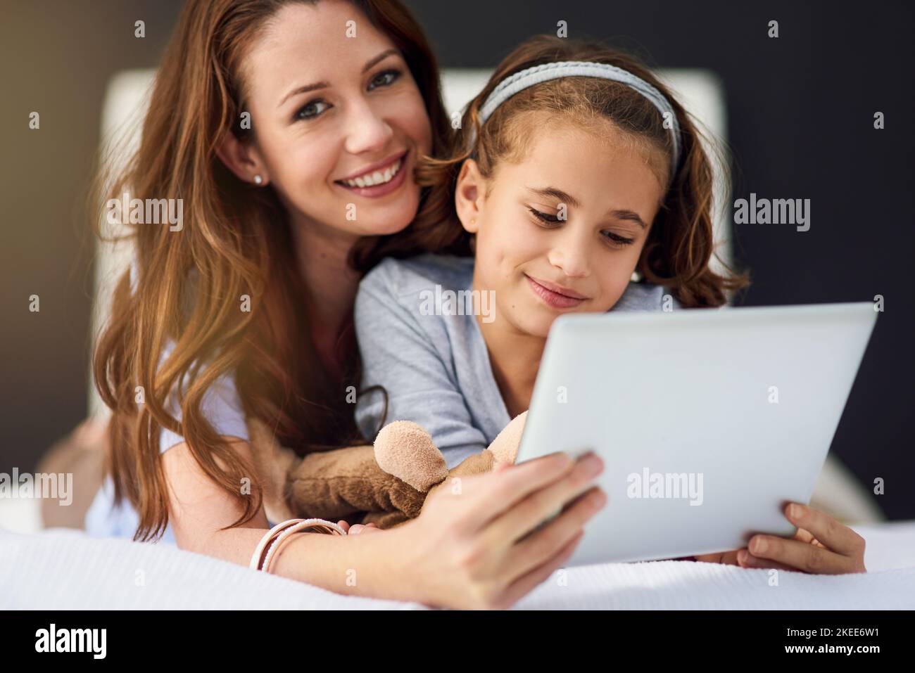 Technology comes easy to kids. Full length shot of a mother and her ...