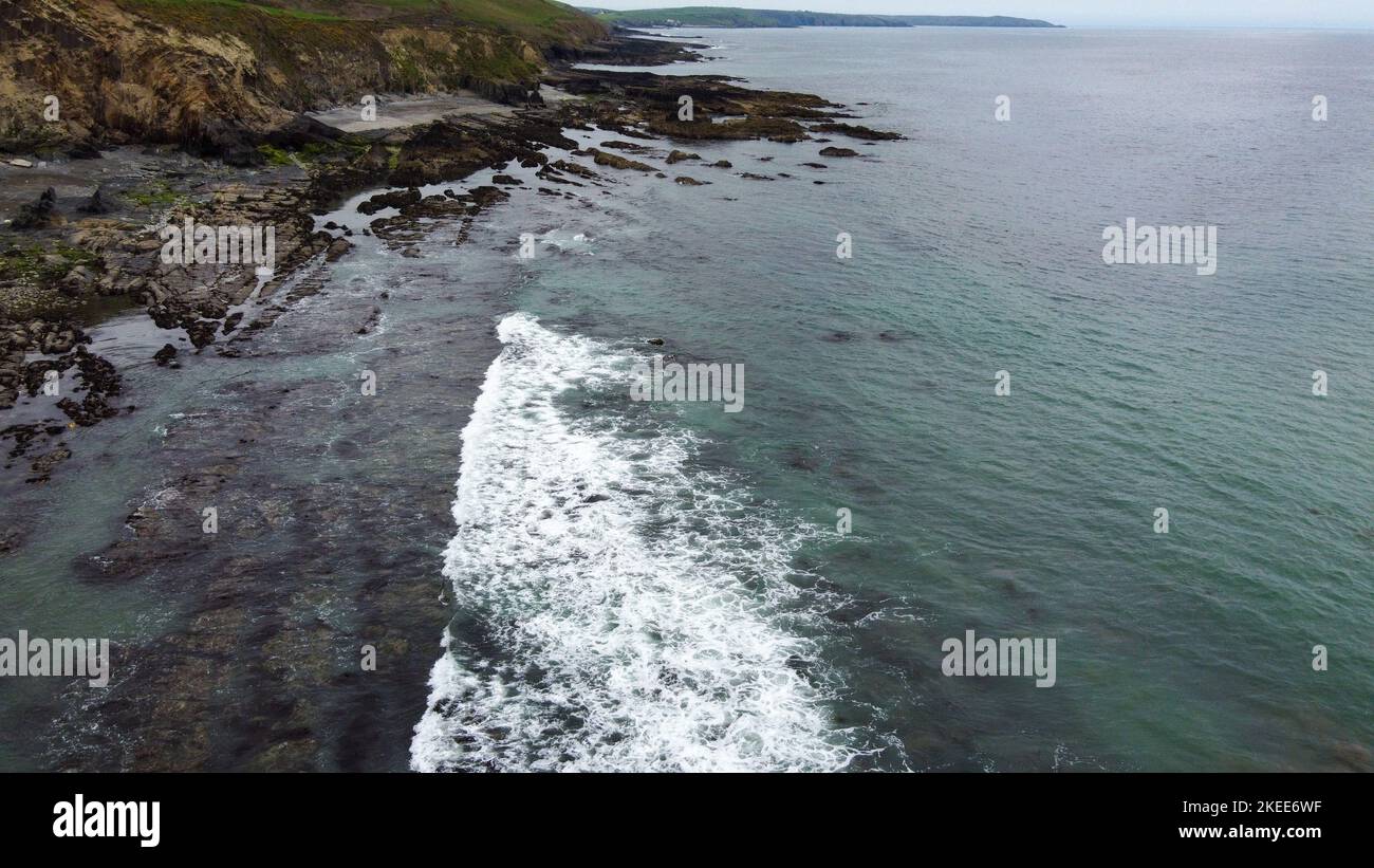 Tidal waves of the Atlantic Ocean. Rocks on the coast of the island of ...