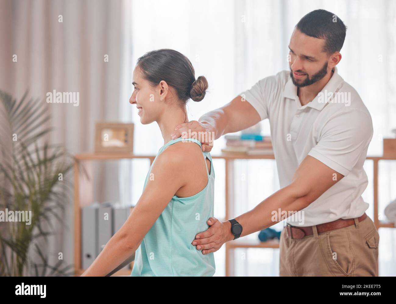 Chiropractor, woman and massage for physical therapy, health and ...