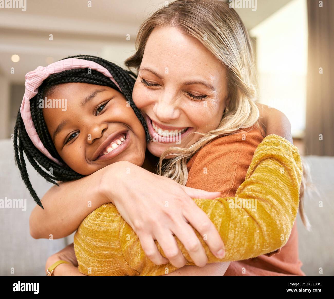 Portrait, family and adoption with a girl and mother hugging in a ...