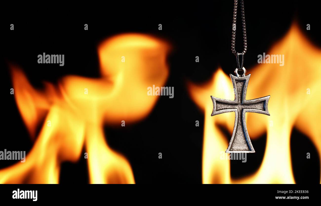 Christian Religion Symbol Cross on Fire Flames Stock Photo - Alamy