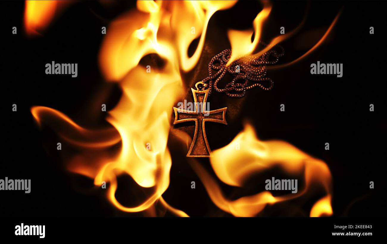 Christian Religion Symbol Cross on Fire Flames Stock Photo - Alamy