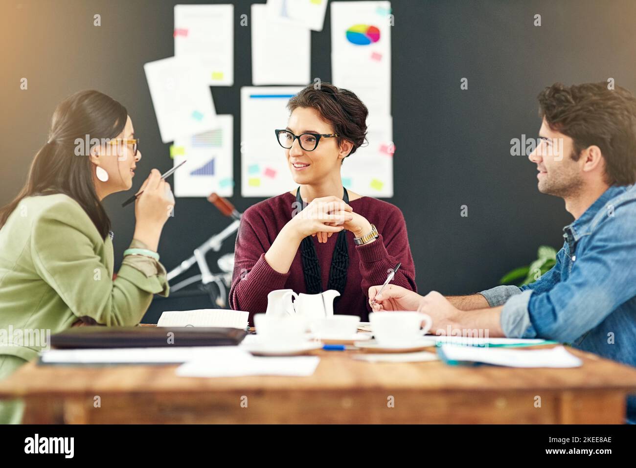 Young creatives team working together hi-res stock photography and ...