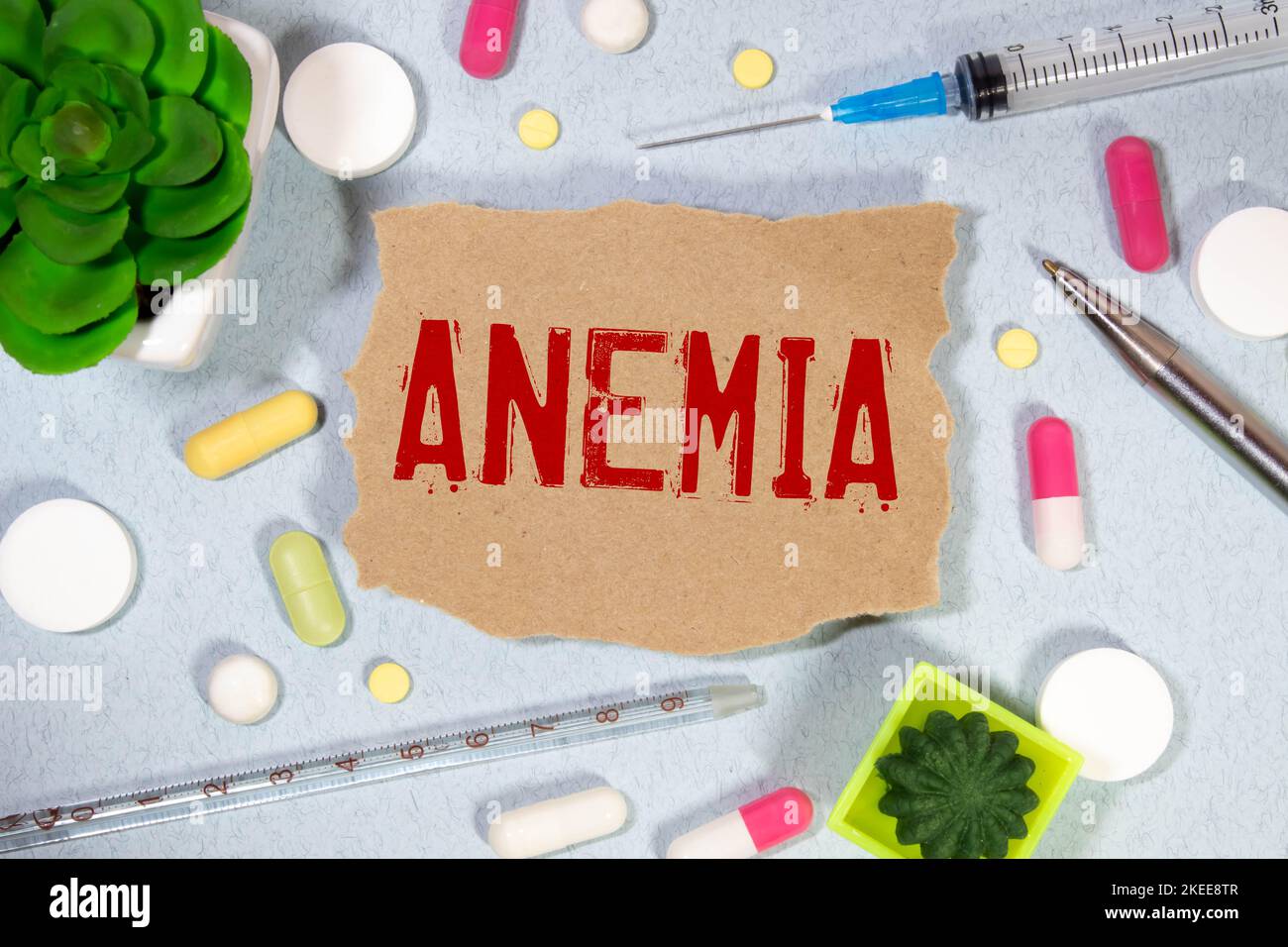 The diagnosis concept - anemia. Sheet with the word anemia on the ...
