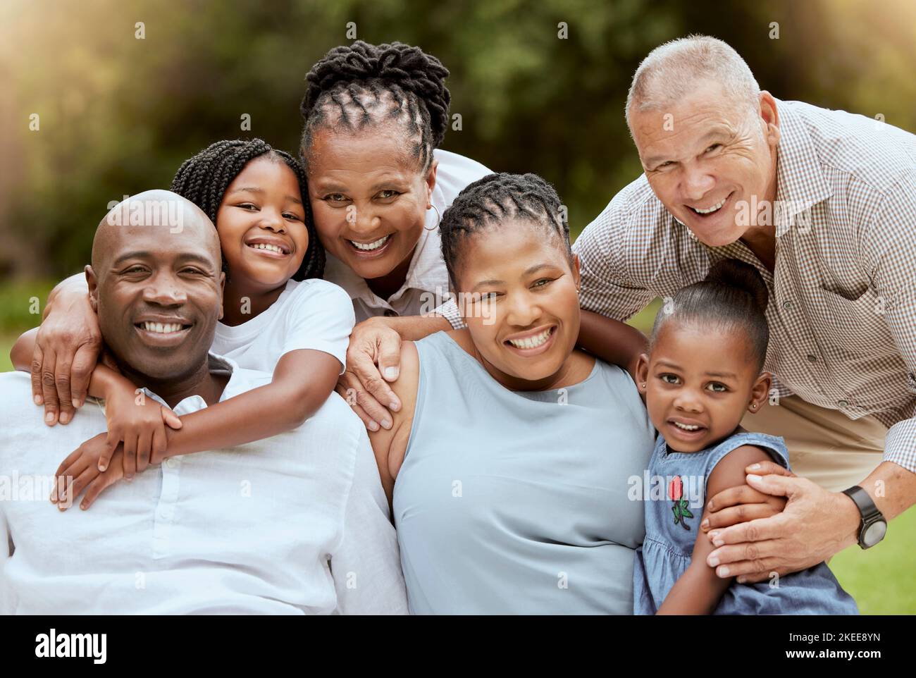 Big family, smile and portrait at park on vacation, holiday or summer ...