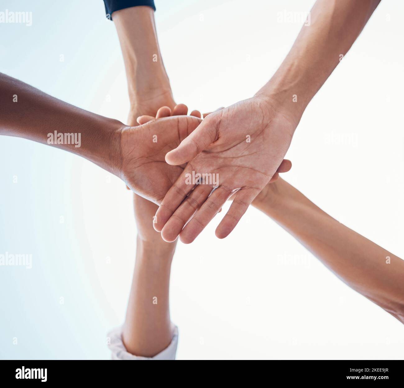 Together, business hands and teamwork circle for community support ...