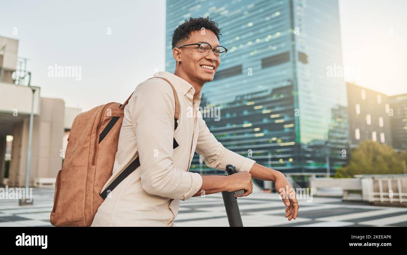 City, happy and man on a scooter to travel in a eco friendly way to ...