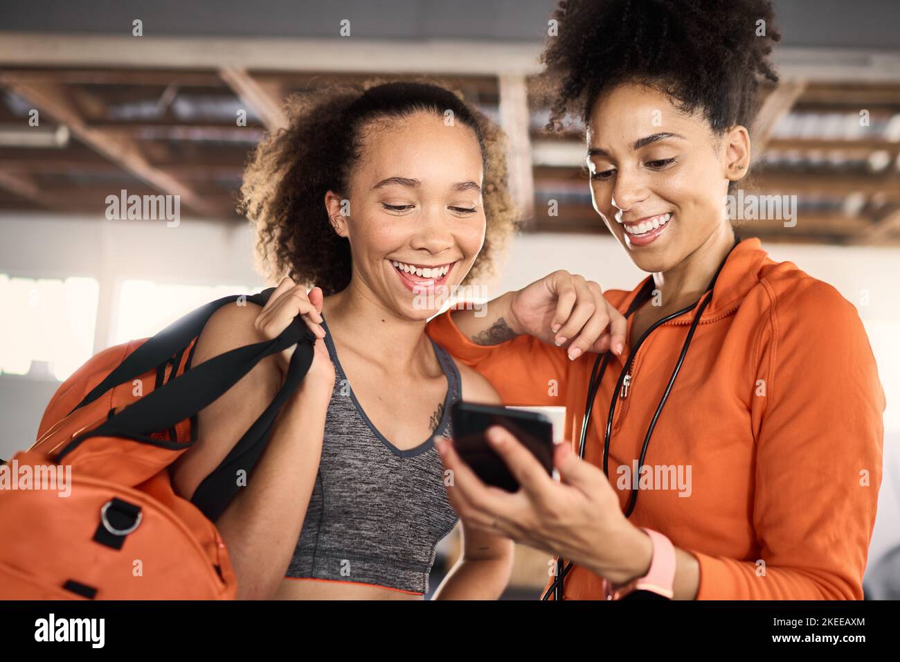 Phone, fitness and friends or athlete checking his social media after a ...