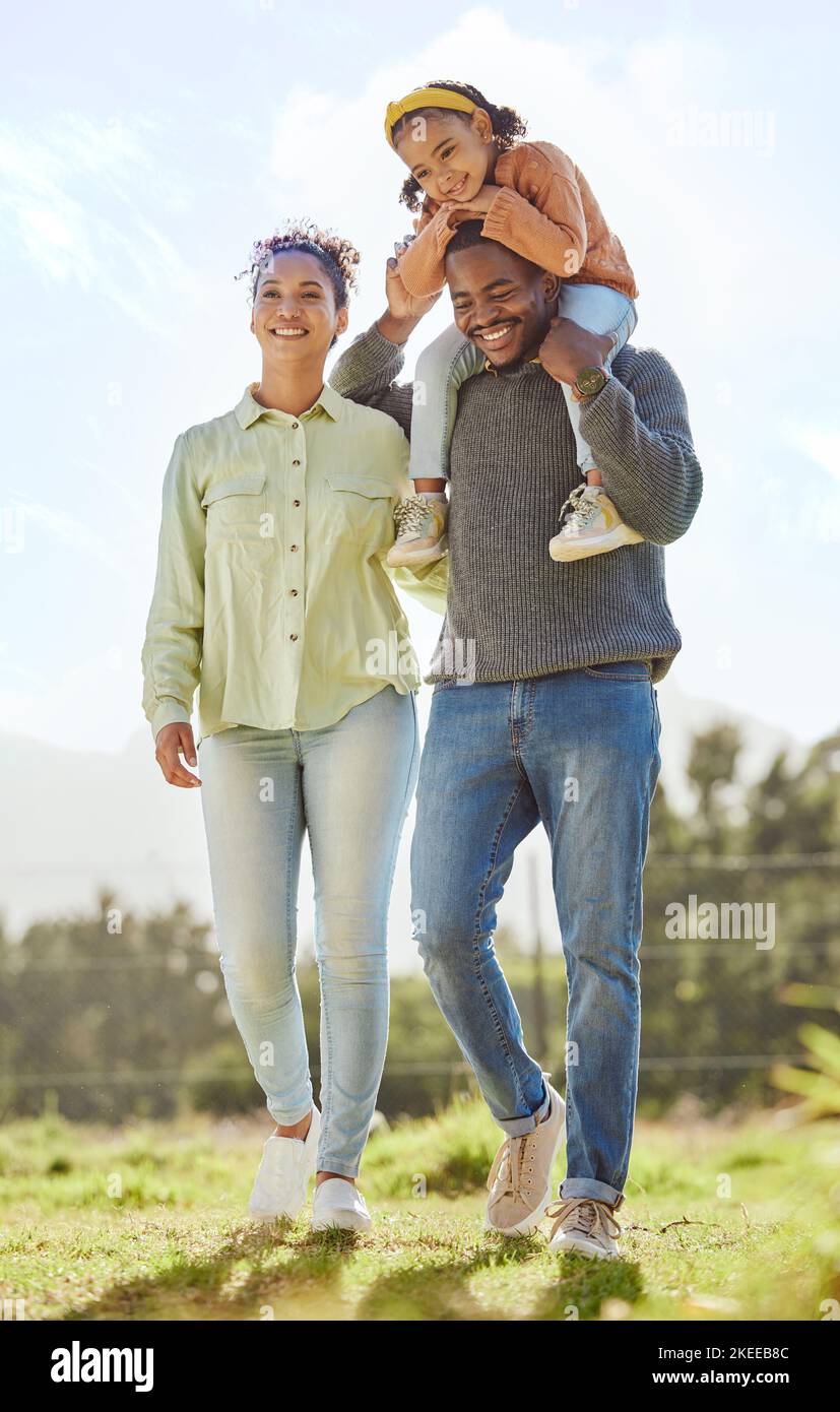 Black family, dad carry girl and outdoor for quality time, happy and ...