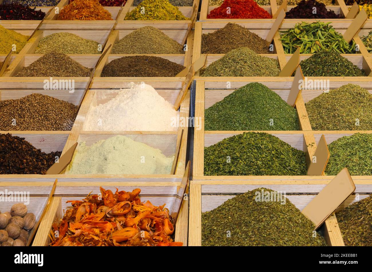 trays with many exotic spices and seeds for ethnic cuisine at the ...