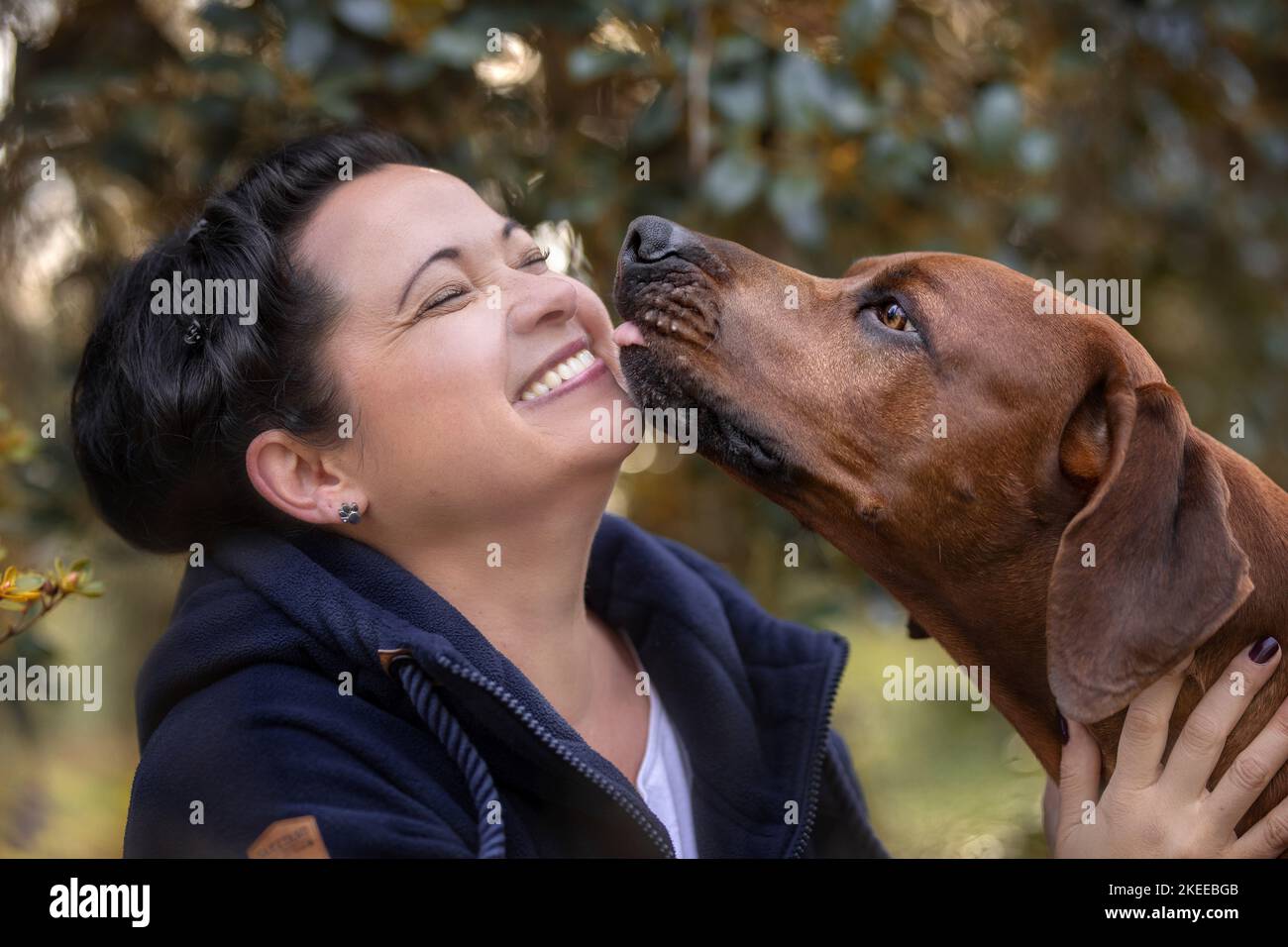 Human heads licking hi-res stock photography and images - Alamy