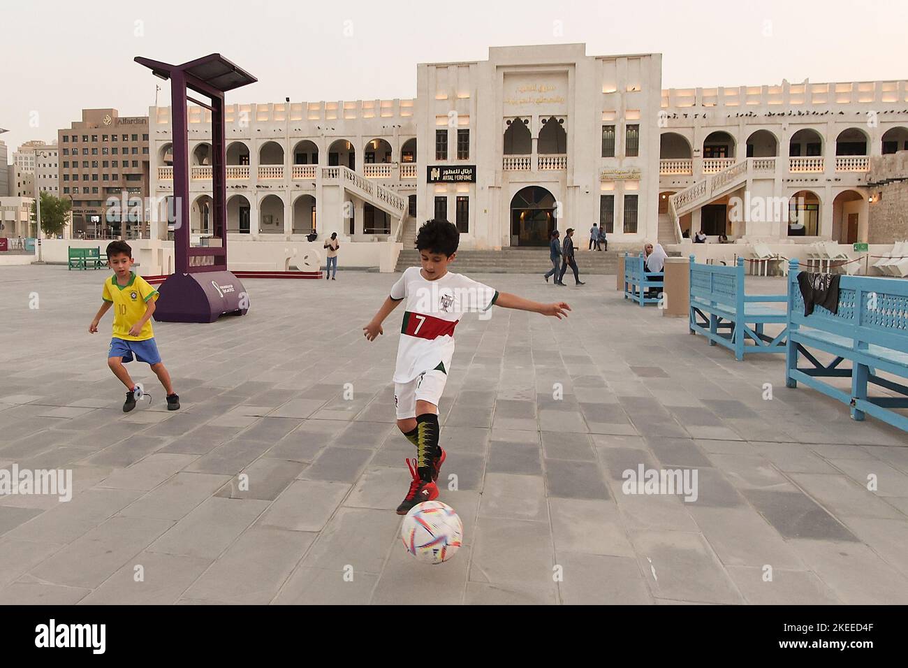 Doha, Qatar. 8th Nov, 2022. Boys play football at Souq Waqif in Doha ...