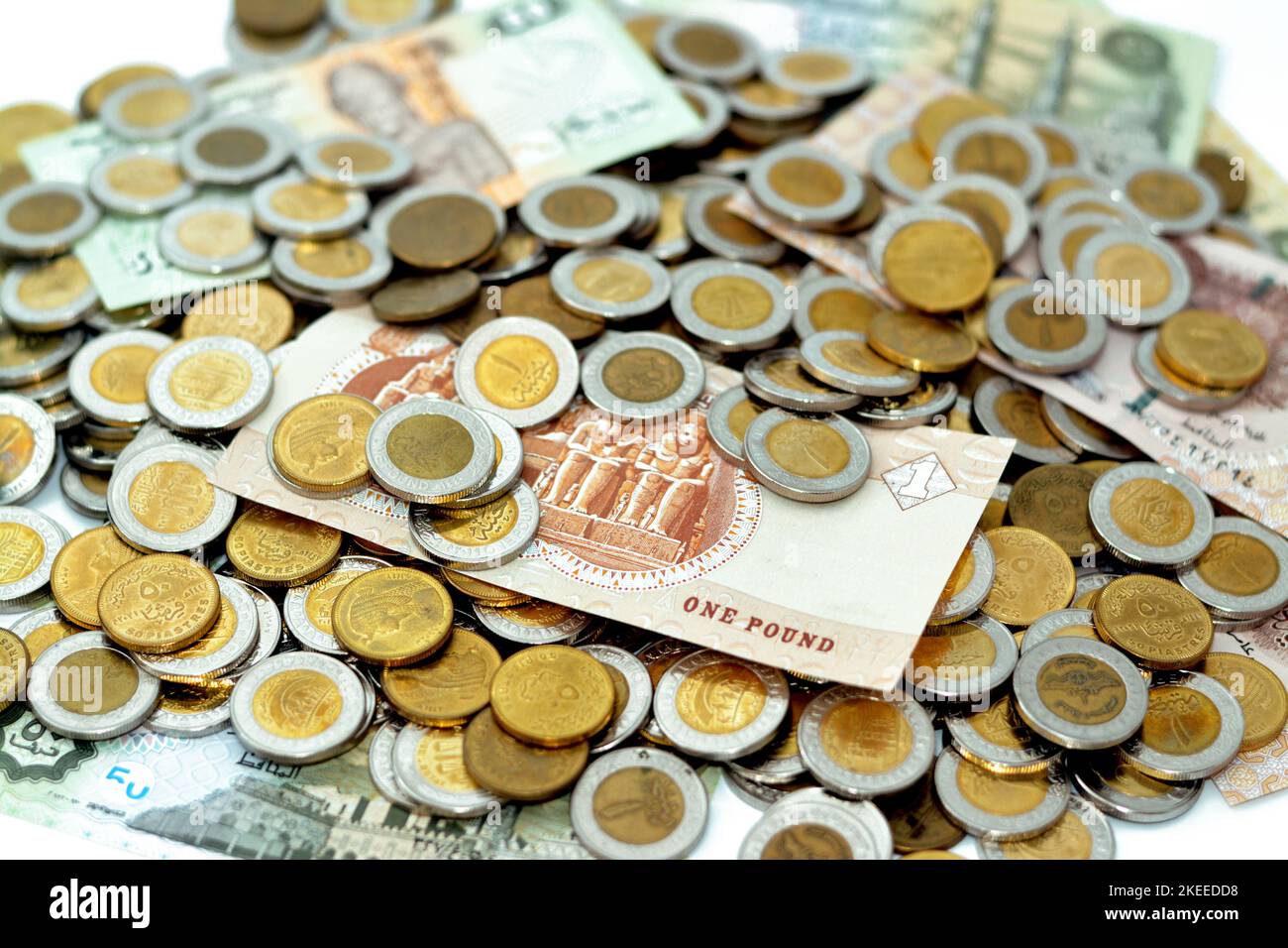 pile of Egyptian money banknotes and coins of 1 EGP LE one Egyptian ...
