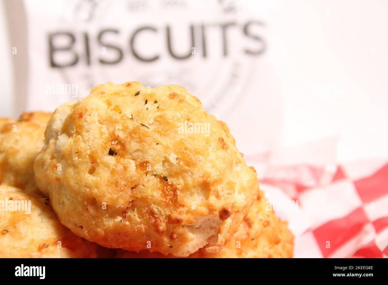 Fresh Garlic Cheese Biscuits With Biscuit Sign in Background Shallow ...