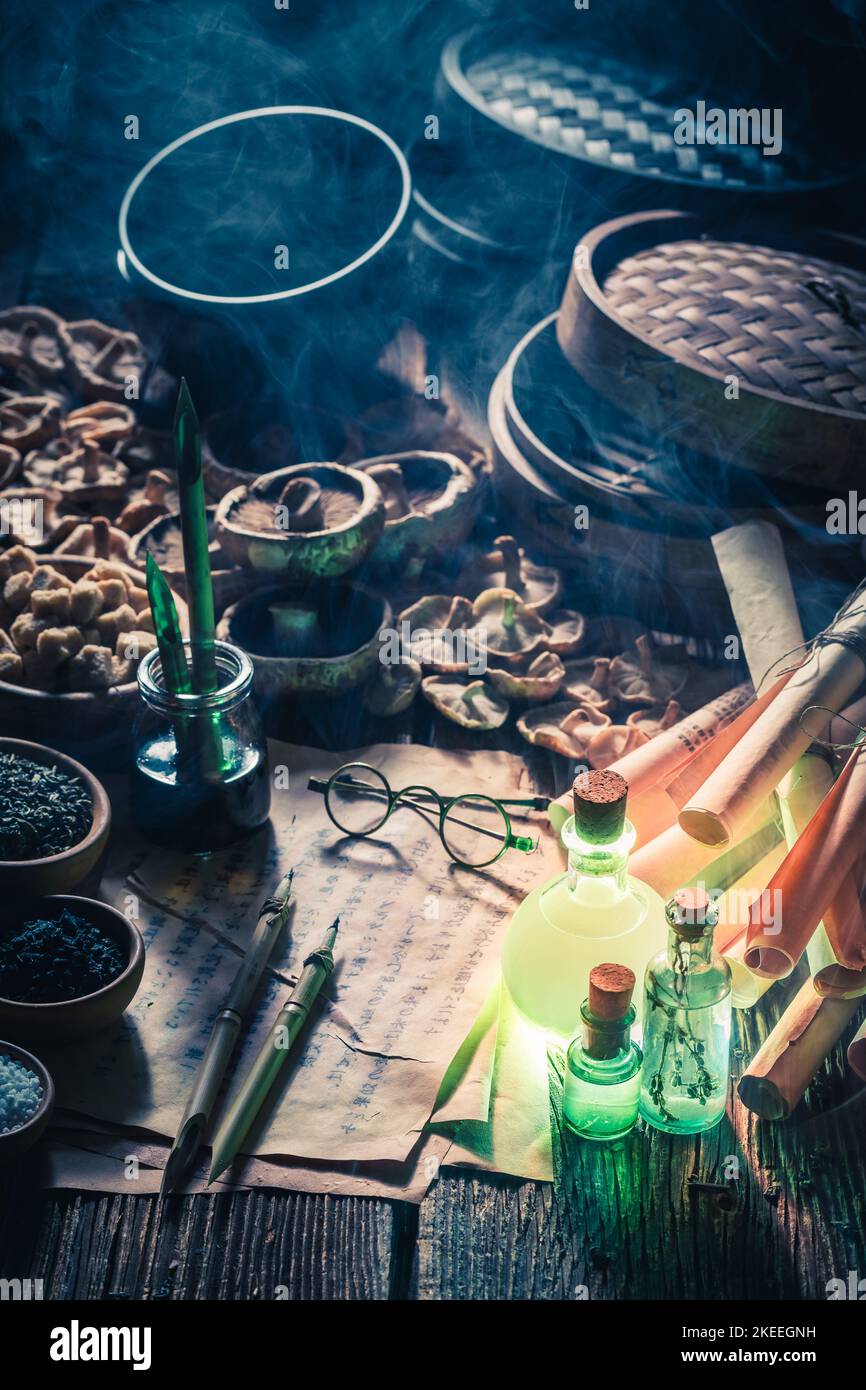 Magical alchemist lab with recipe and old scrolls. Vintage laboratory ...