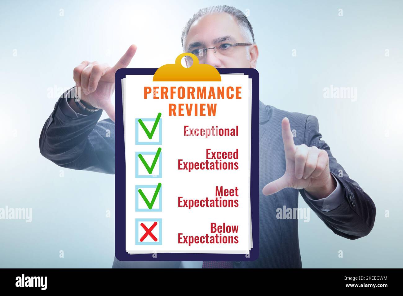Annual performance review concept with the businessman Stock Photo - Alamy