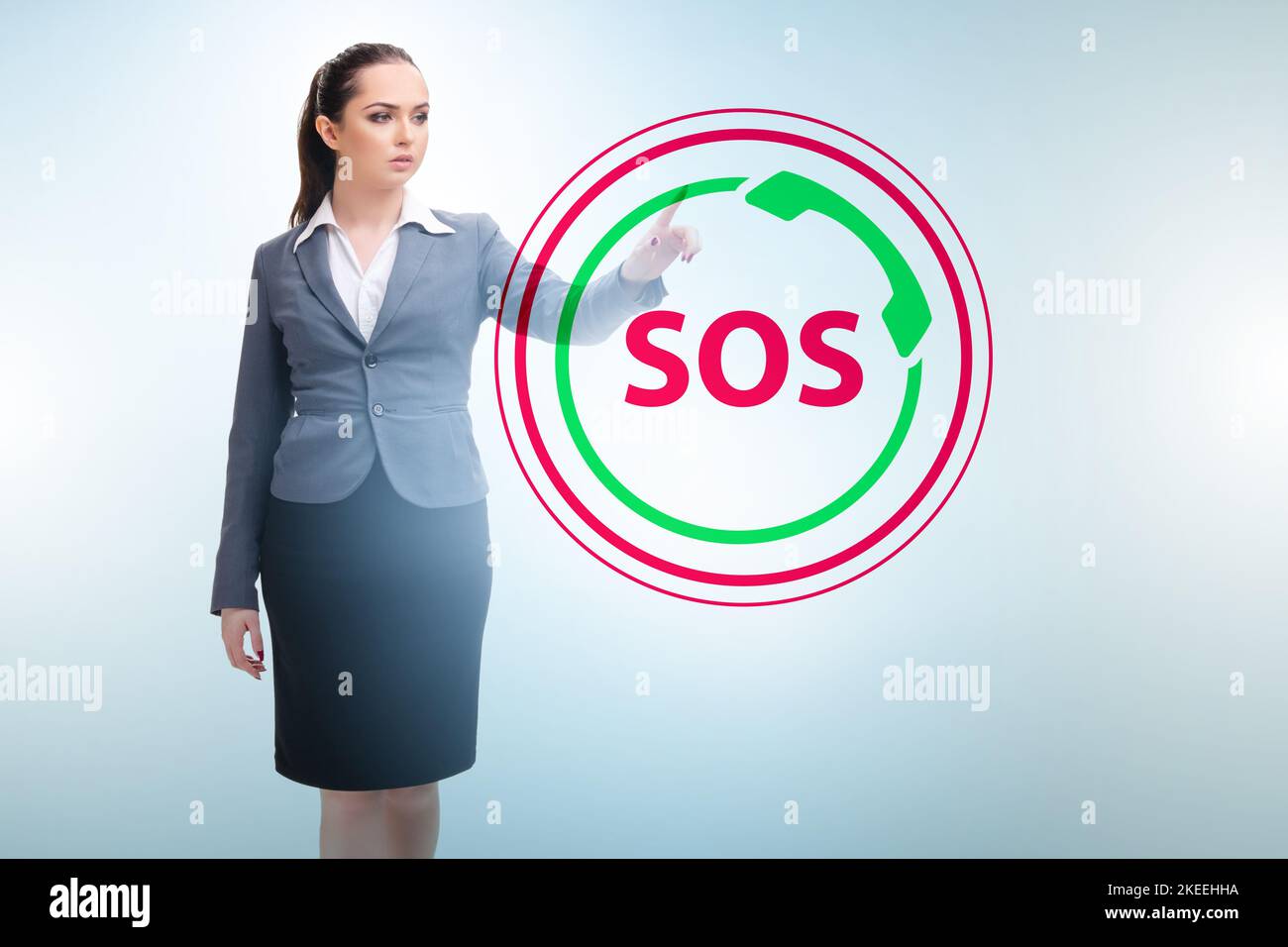 Businesswoman pressing SOS button in the case of danger Stock Photo - Alamy