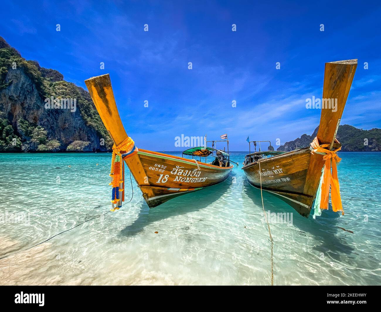 Long Tail boat in Monkey Beach in koh Phi Phi Don island, in Krabi, Thailand Stock Photo - Alamy