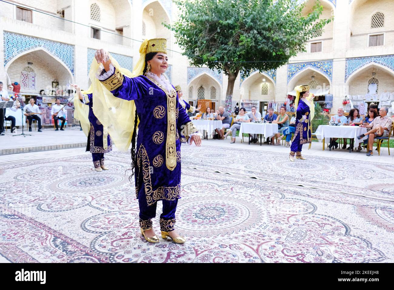 Bukhara Uzbekistan - dancers entertain visitors and diners in the ...