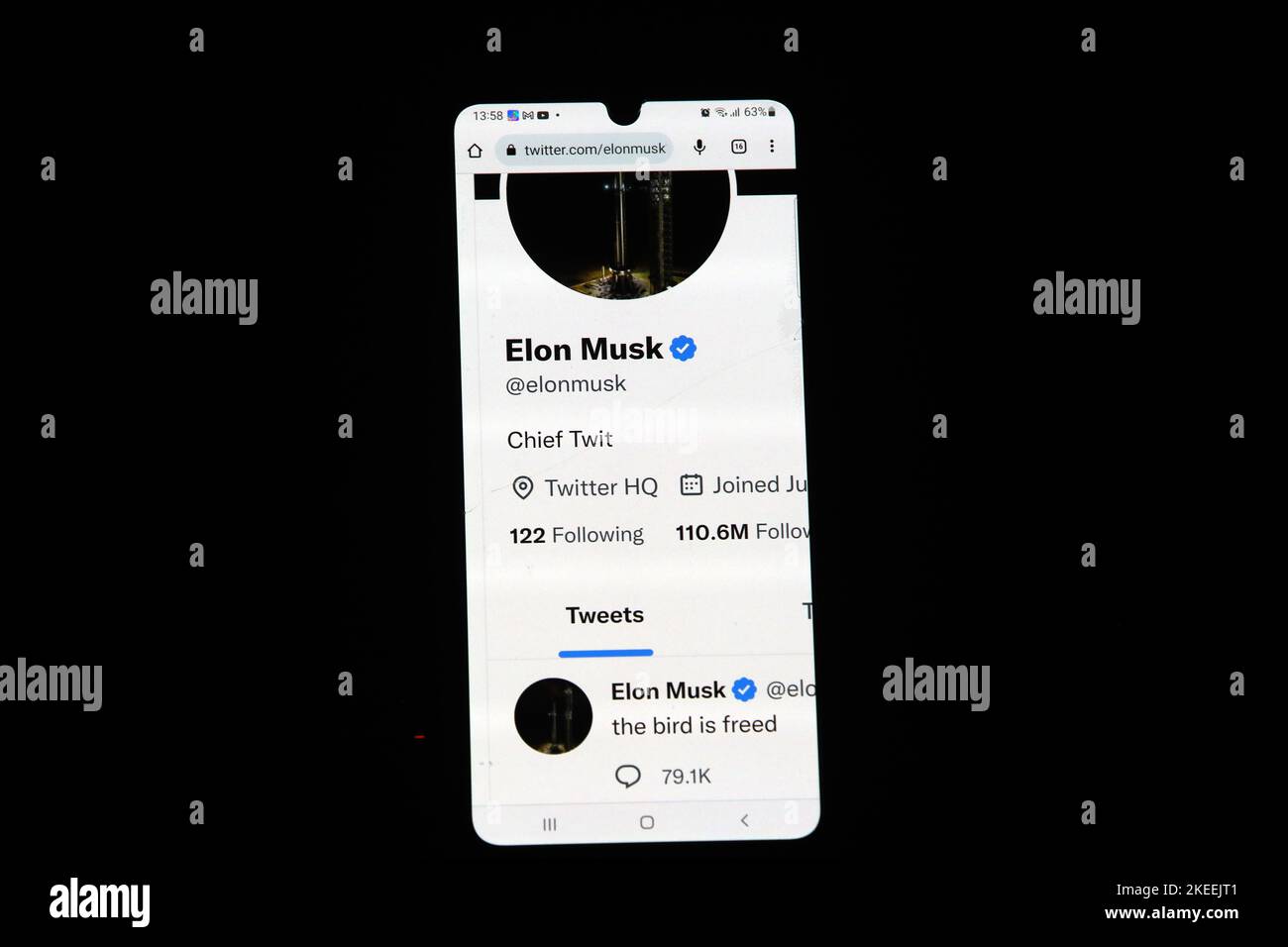 A Palestinian man displays the Twitter account of billionaire Elon Musk ...