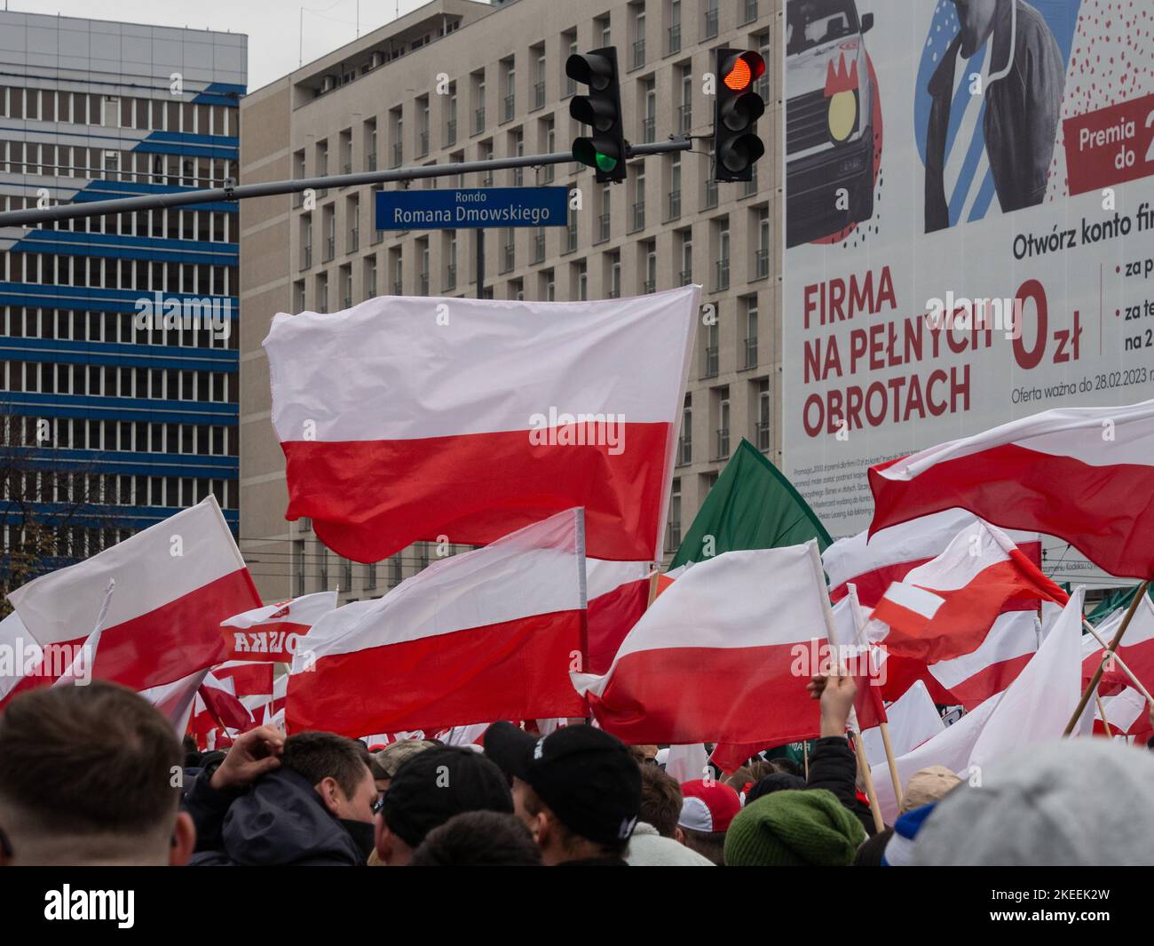 Polish flags carried by marchers in the Independence Day parade ...