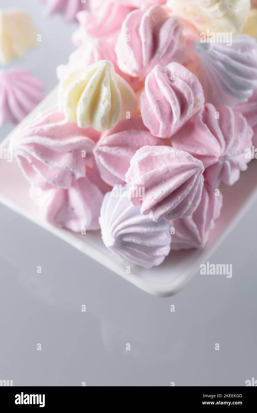 Homemade colorful meringue on a glass table Stock Photo - Alamy