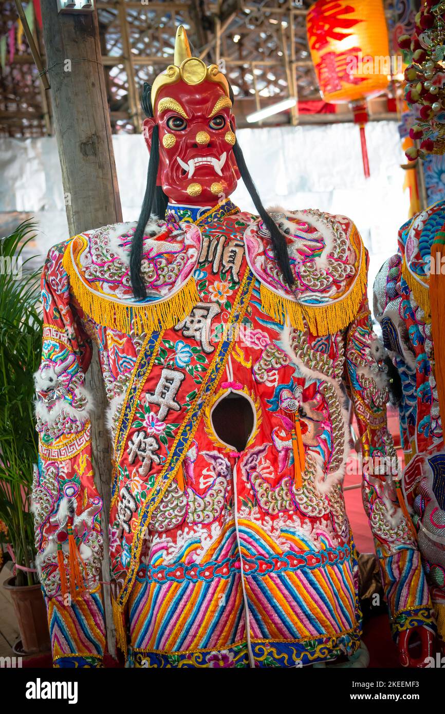 Elaborate, colourful life-size puppet of a demon, used in processions ...