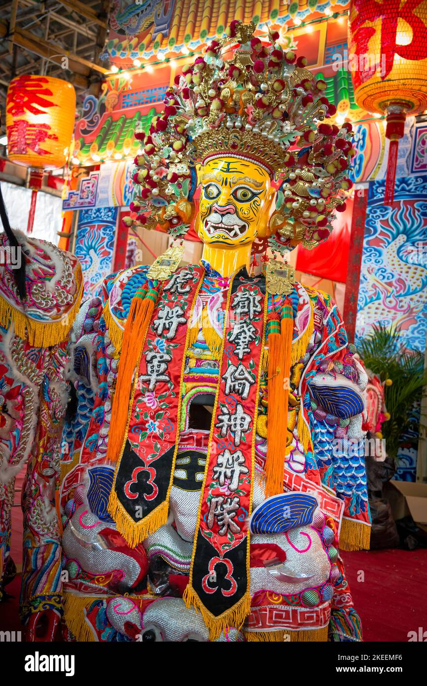 Elaborate, colourful life-size puppet of a demon, used in processions ...