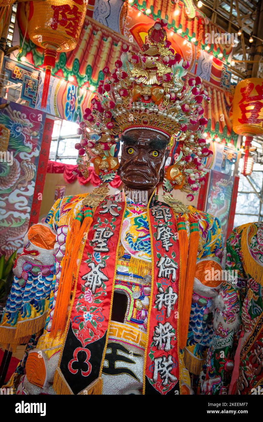 Elaborate, colourful life-size puppet of a demon, used in processions ...