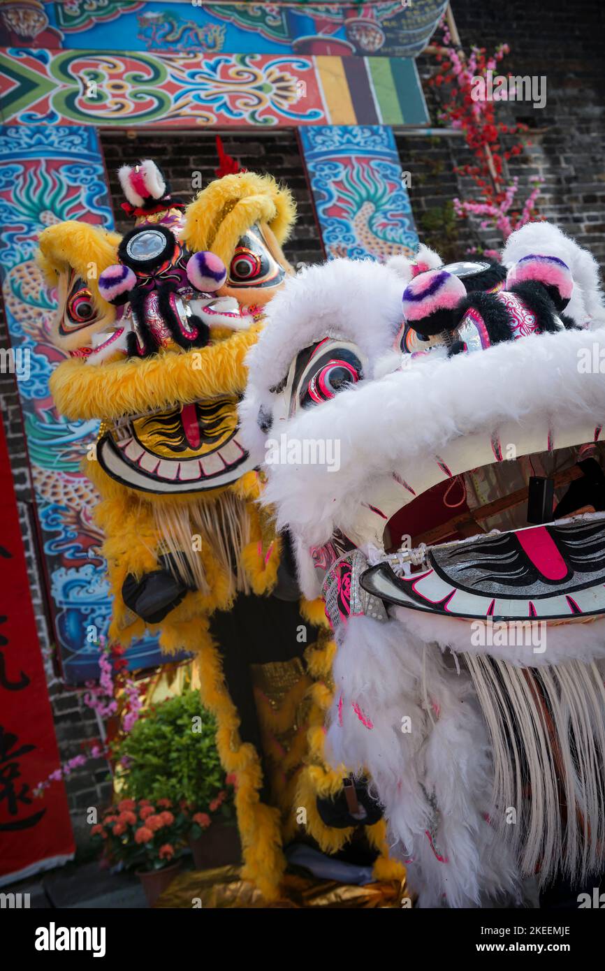 Elaborate lion dance puppets on display at the entrance to Kat Hing Wai ...