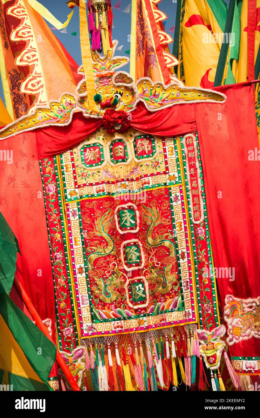 A richly embroidered processional banner featuring a dragon motif at ...