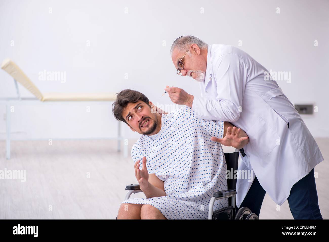 Old doctor psychiatrist examining young disabled patient Stock Photo ...