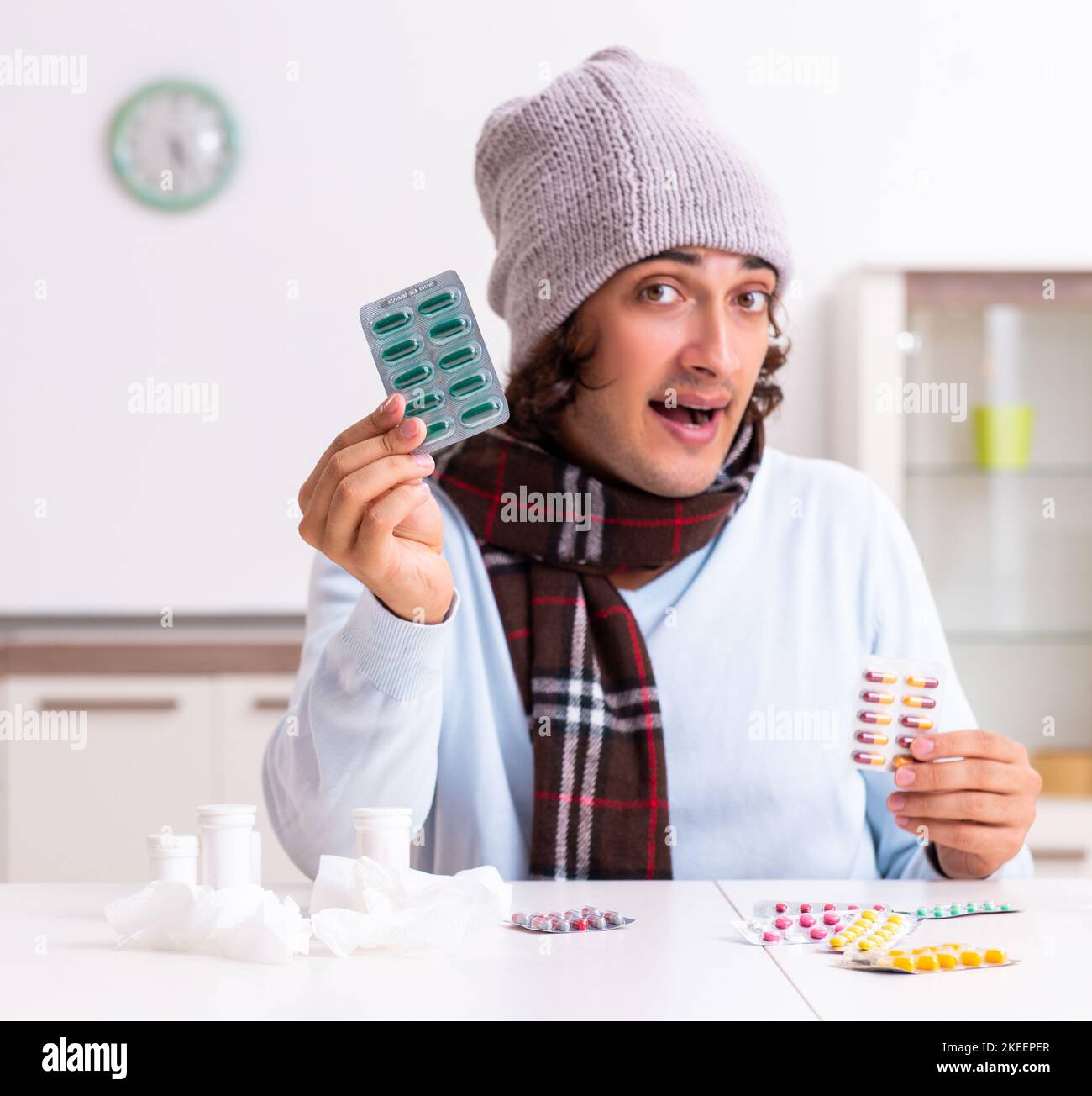 Young man suffering from flu at the home Stock Photo - Alamy