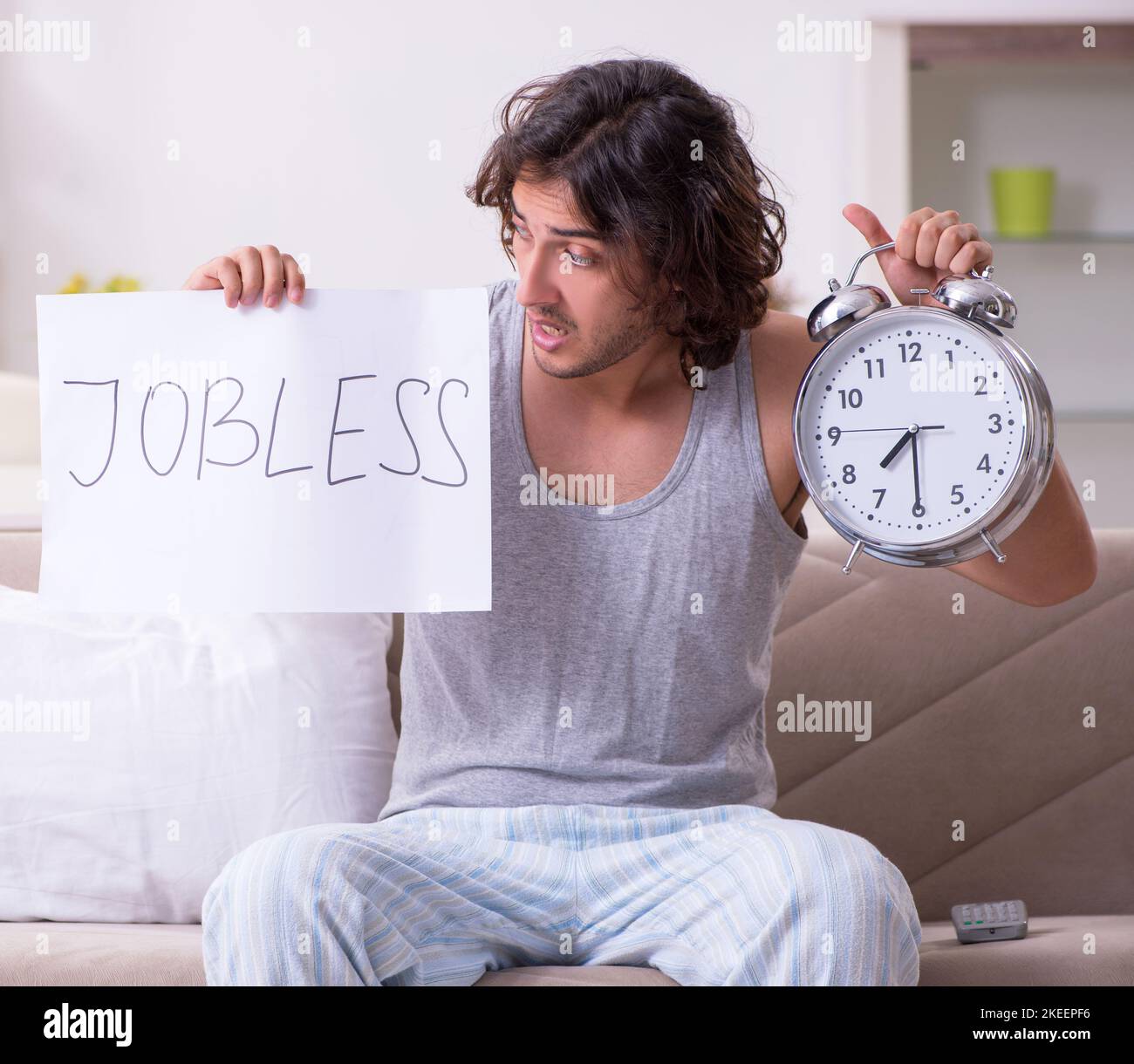 The unemployed man desperate at home Stock Photo - Alamy
