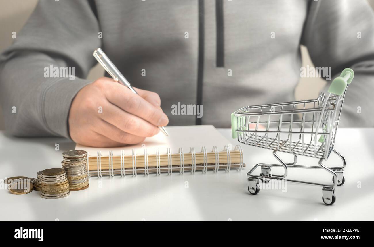 Man counting budget, expenses and savings. Low income family living ...