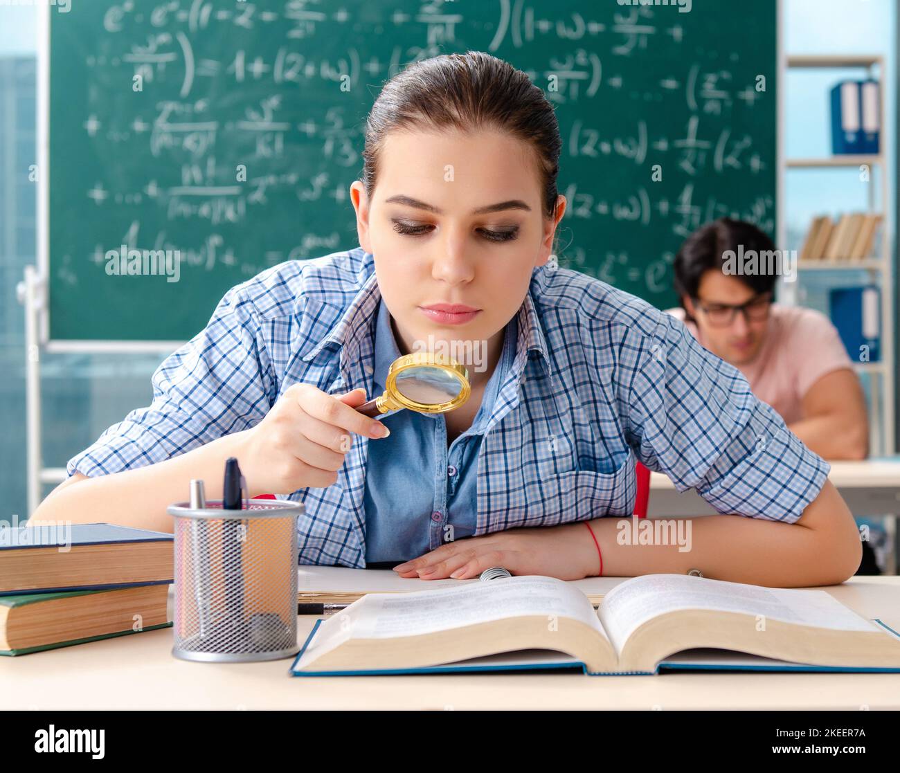 Young students taking the math exam in classroom Stock Photo - Alamy