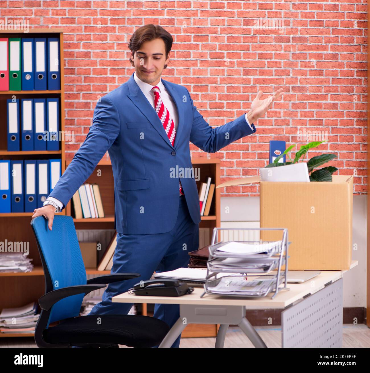 Successful employee getting new job position Stock Photo - Alamy