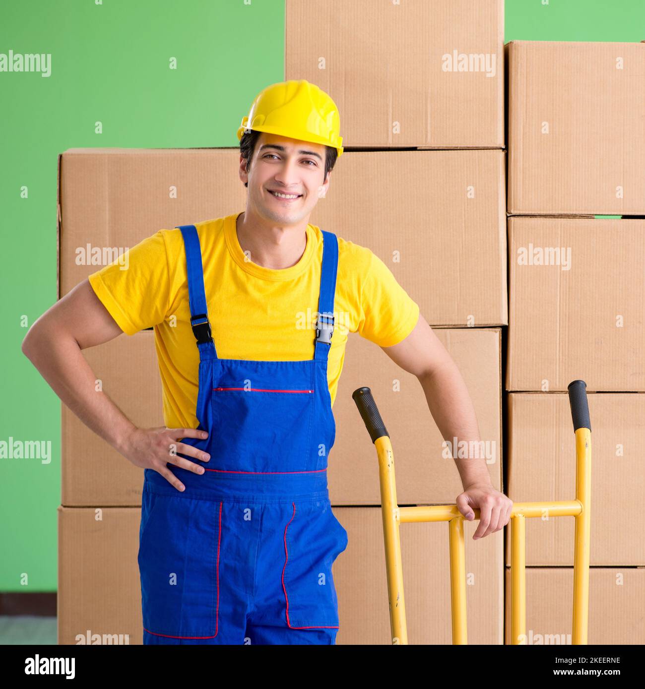 The man contractor working with boxes delivery Stock Photo - Alamy