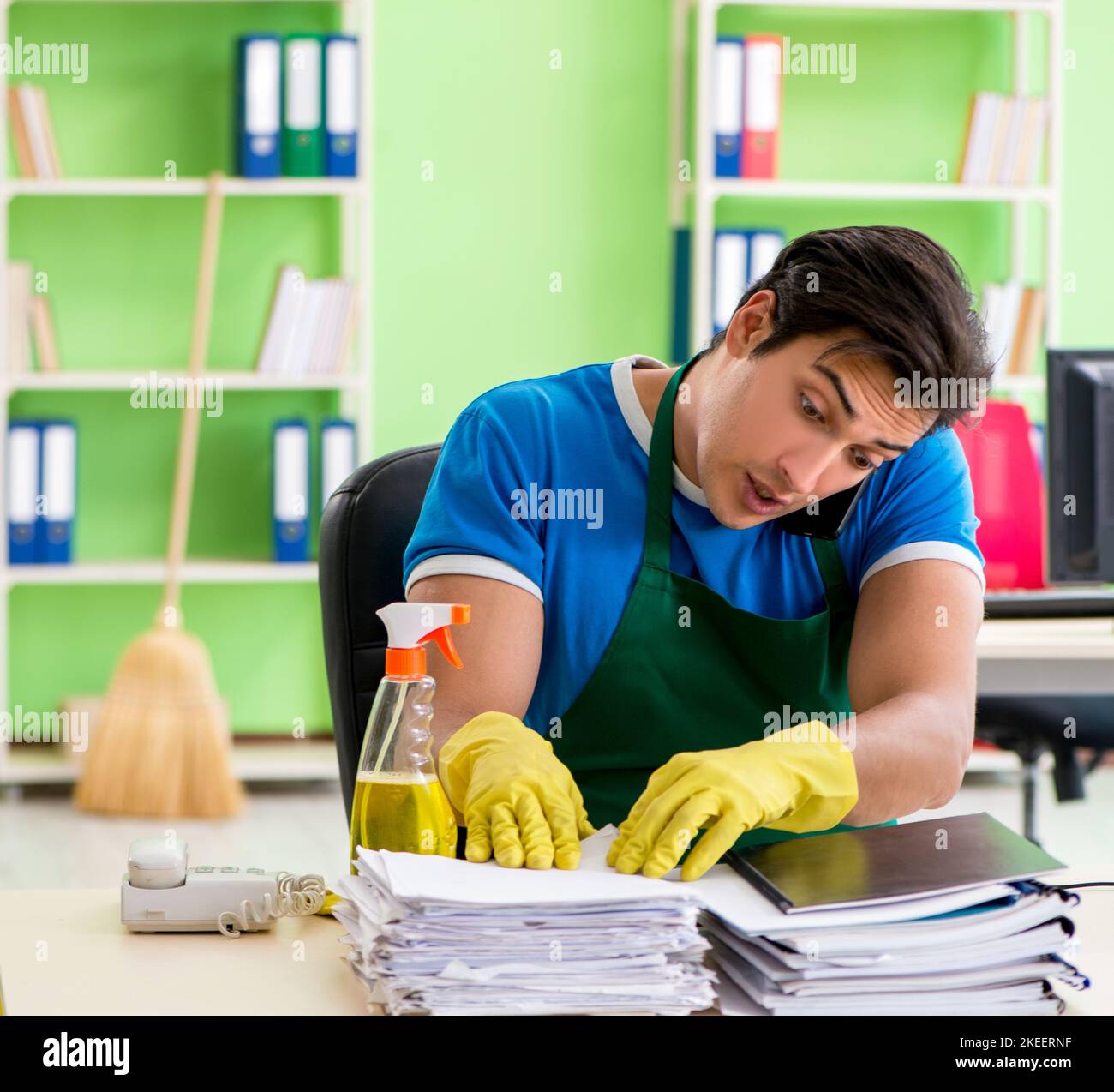 The male spy under cleaner cover stealing confidential documents Stock ...