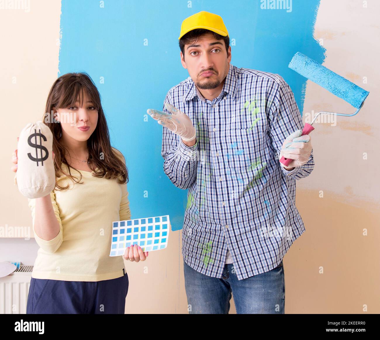 The husband and wife doing renovation at home Stock Photo - Alamy