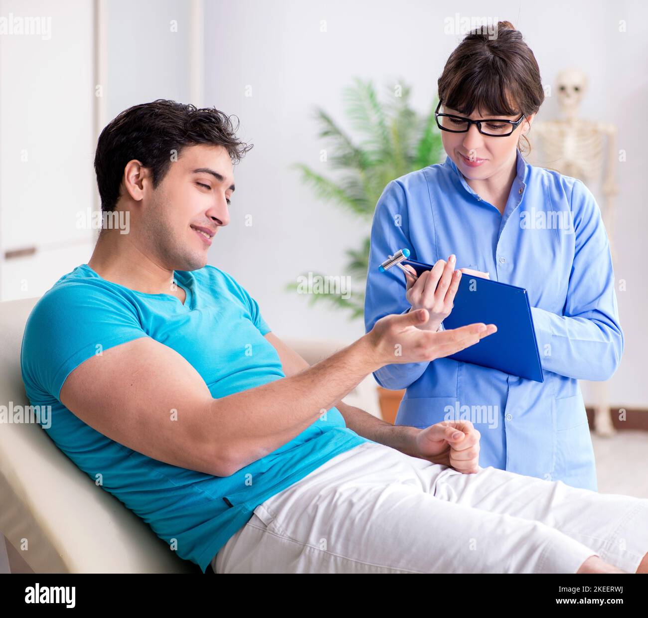 The doctor checking nerve reflexes with hammer Stock Photo - Alamy