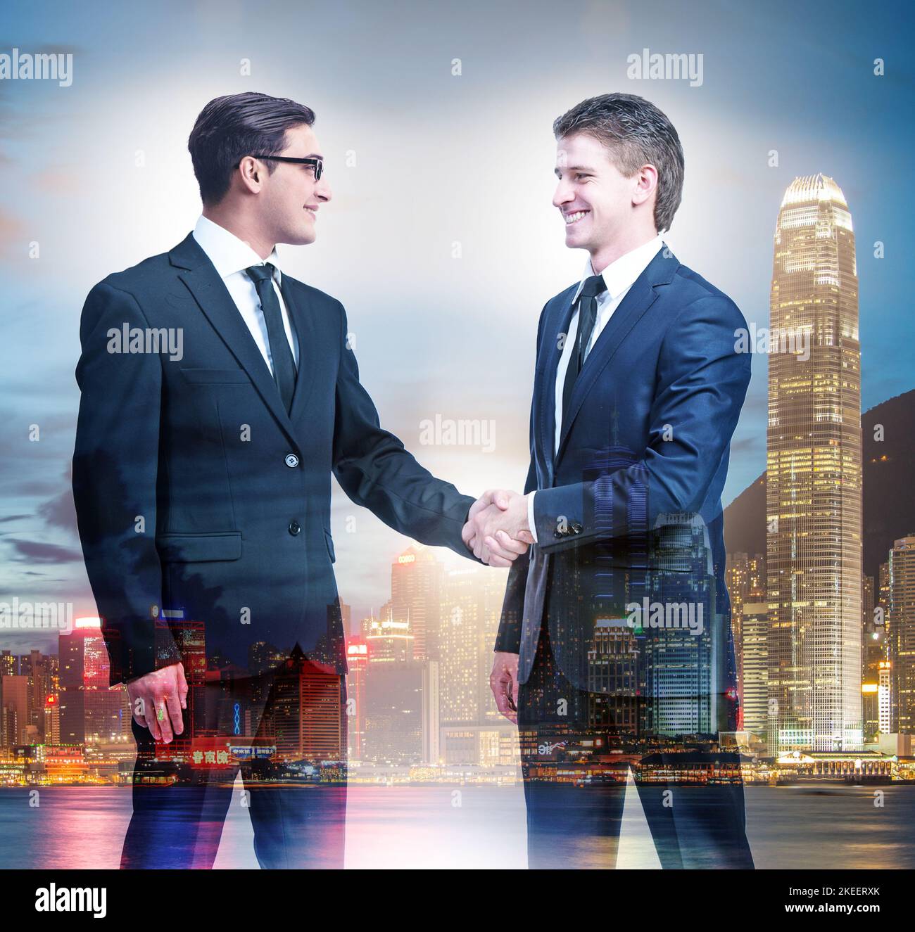 Businessman shaking their hands in agreement Stock Photo - Alamy