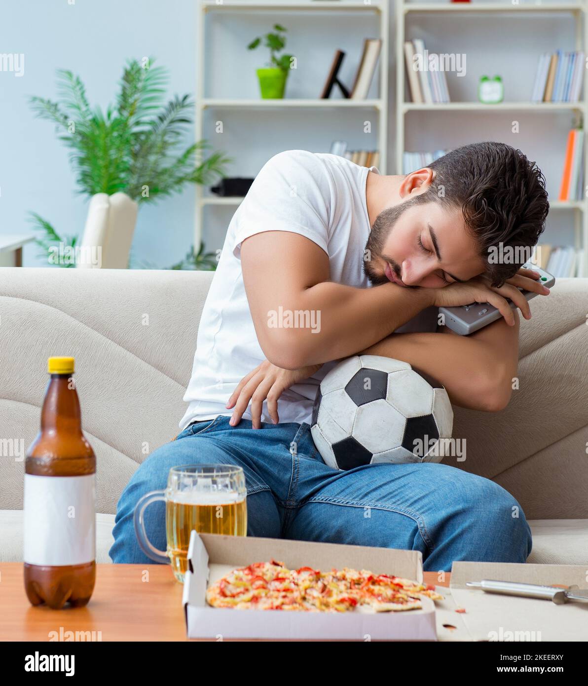 The man eating pizza having a takeaway at home relaxing resting Stock ...