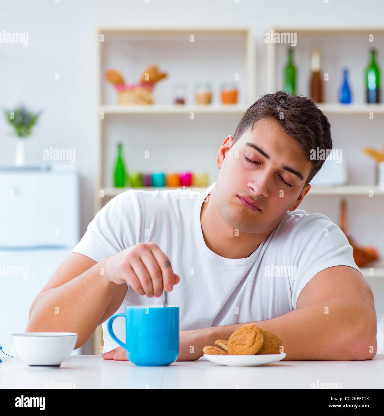 The man falling asleep during his breakfast after overtime work Stock ...